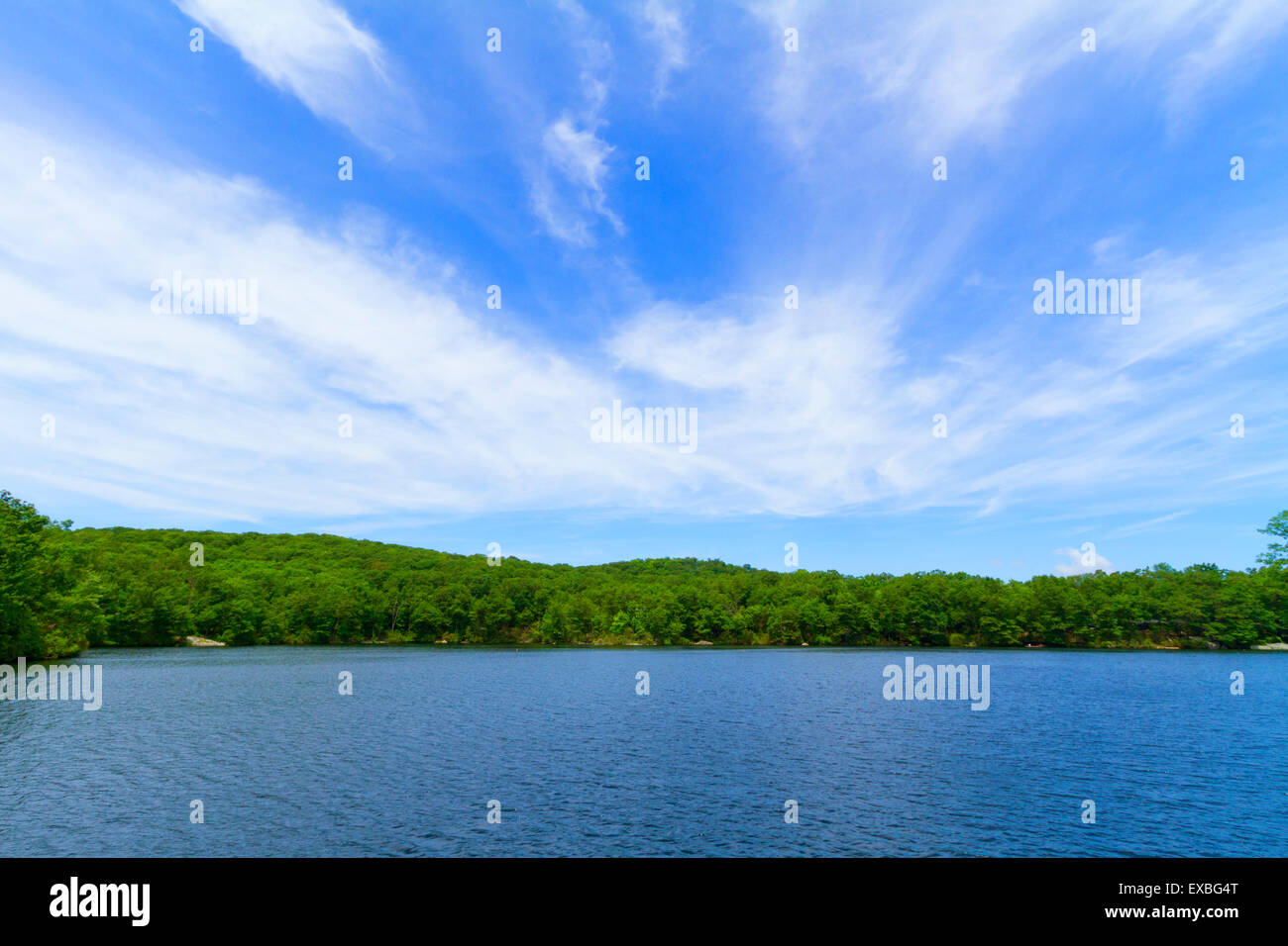 Beautiful view of sunset on the forest lake Stock Photo - Alamy