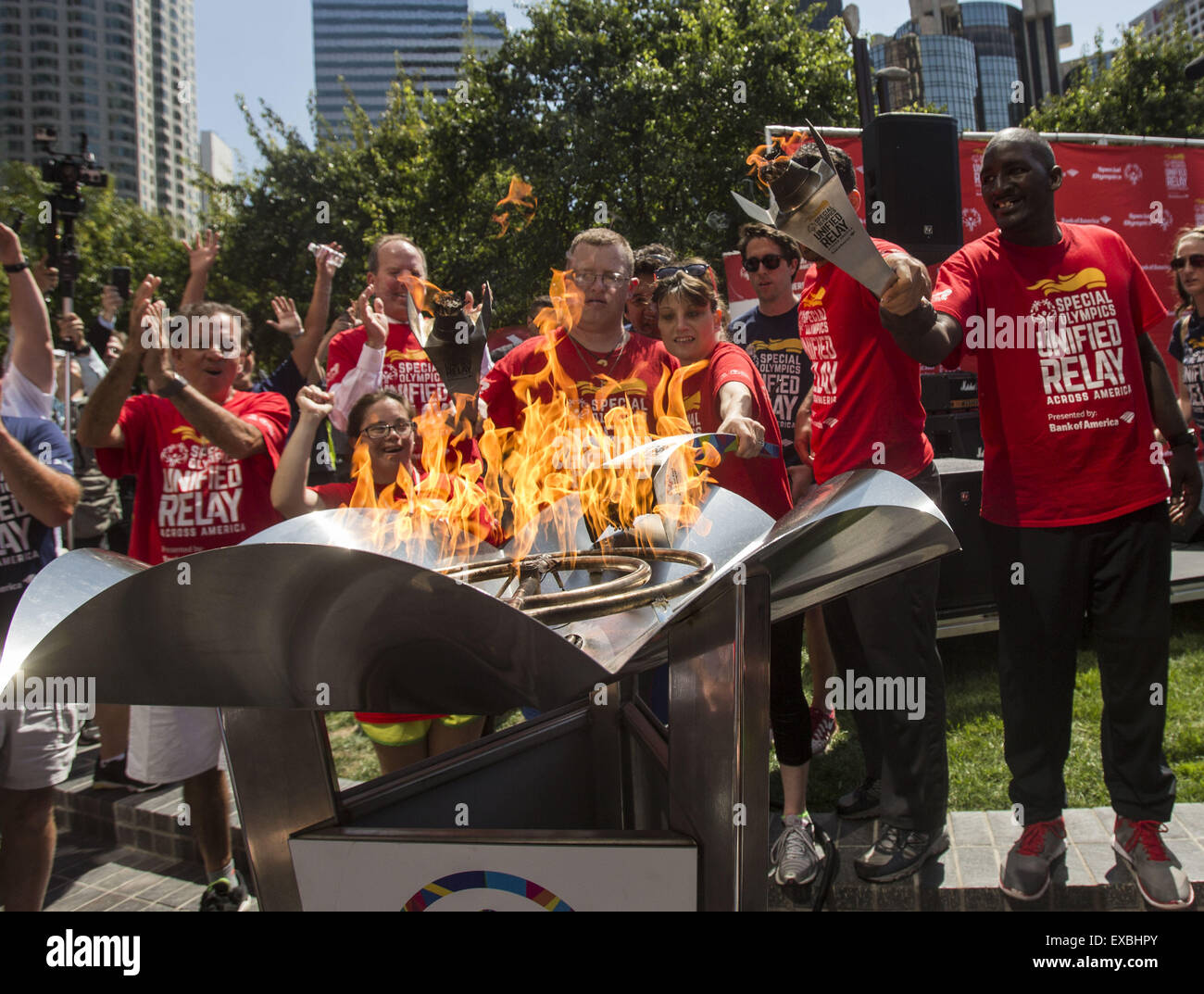 Los Angeles, California, USA. 10th July, 2015. Torch bearers carrying ...