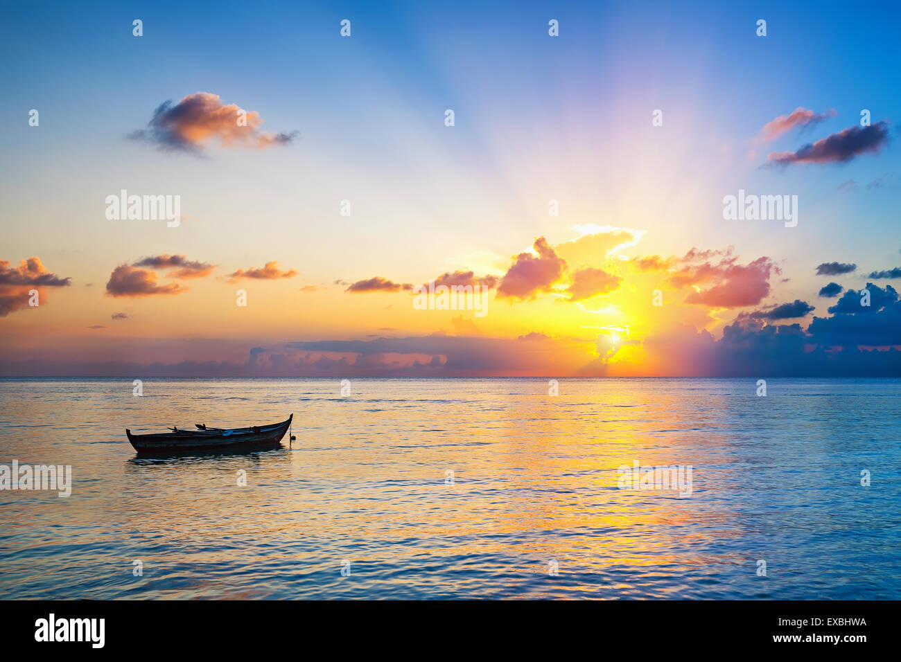 Sunrise over ocean Stock Photo - Alamy