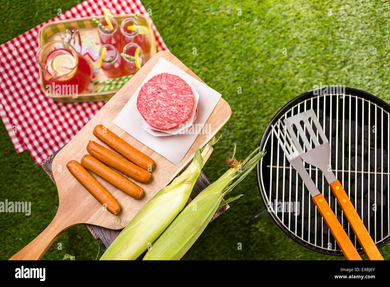 Summer picnic with small charcoal grill in the park Stock Photo - Alamy