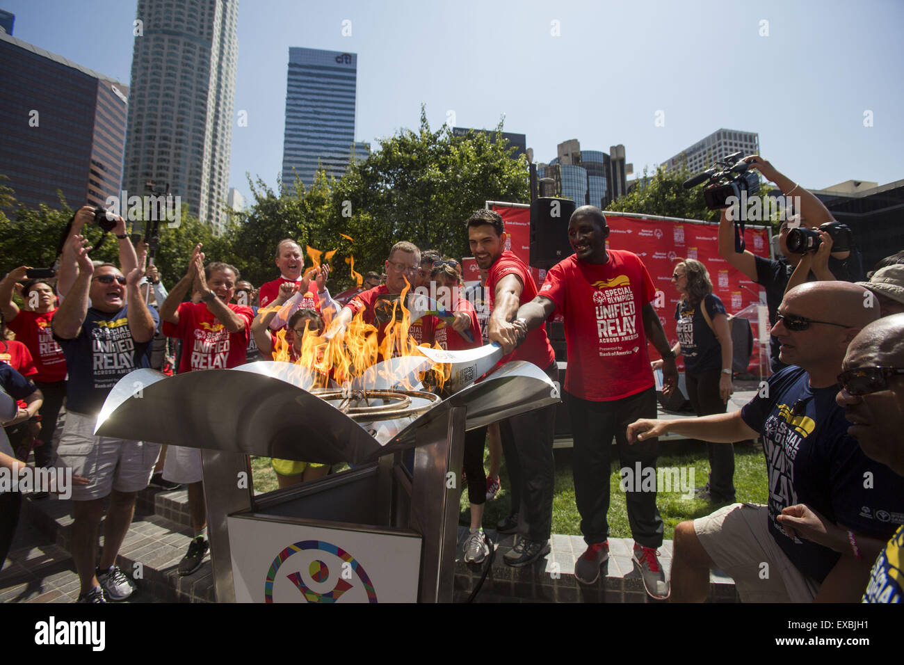 Los Angeles, California, USA. 10th July, 2015. Torch bearers carrying ...