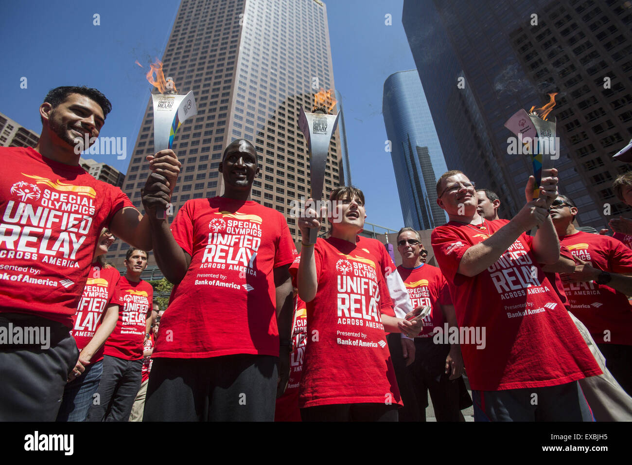 Los Angeles, California, USA. 10th July, 2015. Torch bearers carrying ...