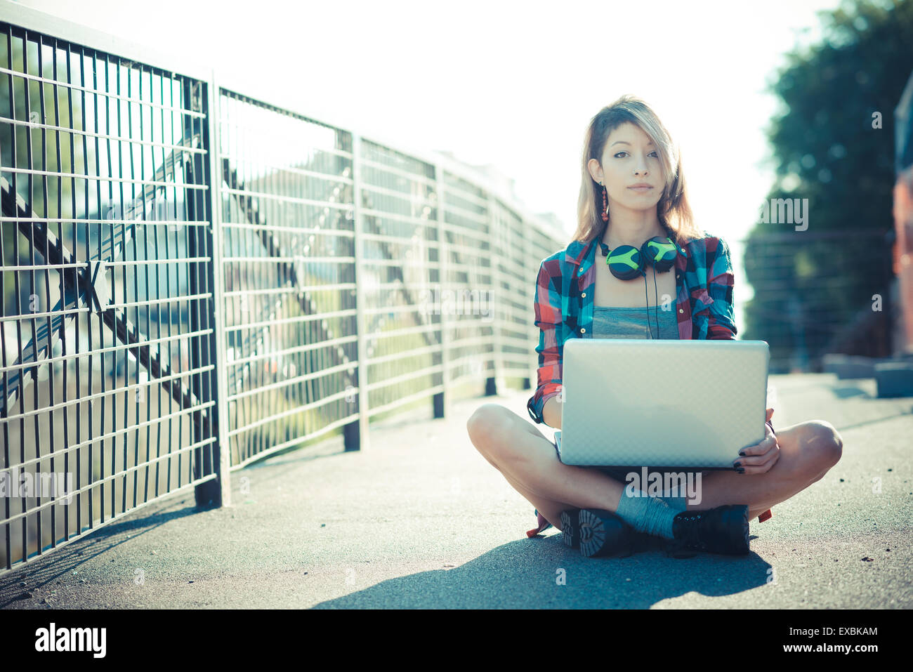 young beautiful model woman using notebook in the city Stock Photo - Alamy