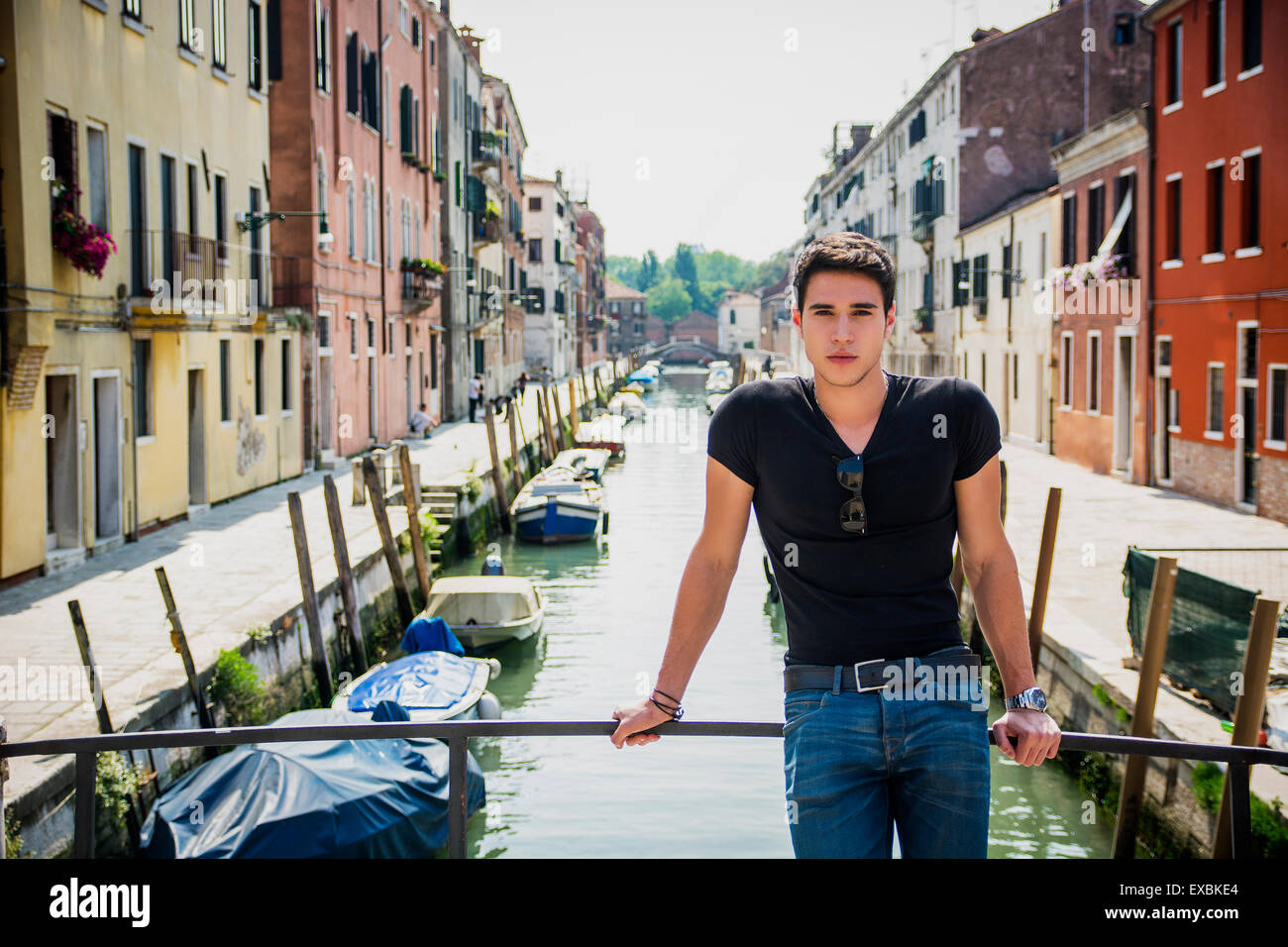 Man leaning over railing hi-res stock photography and images - Alamy