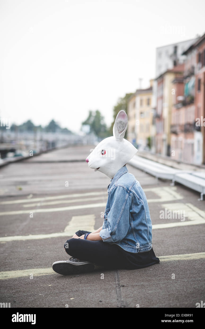 rabbit mask young handsome bearded hipster man in the city Stock Photo ...