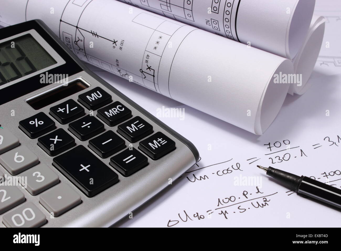 Rolls of electrical diagrams, calculator and mathematical calculations ...