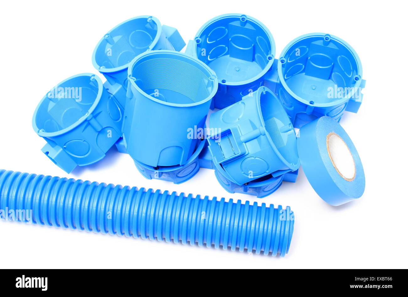 Heap of blue electrical boxes and components for use in electrical ...
