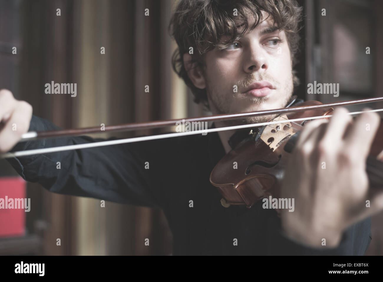 young handsome blonde italian violinist Stock Photo - Alamy
