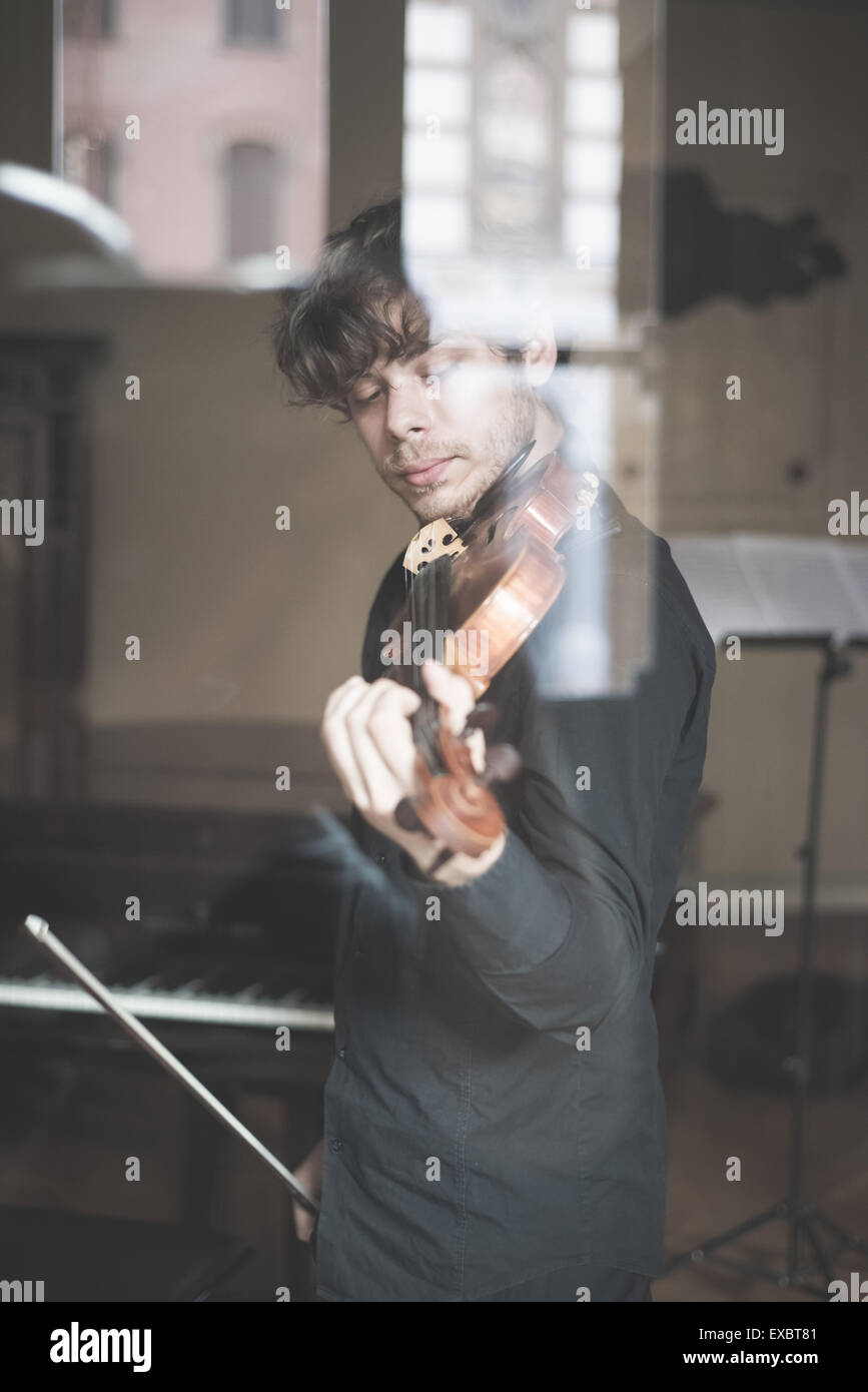 young handsome blonde italian violinist Stock Photo - Alamy