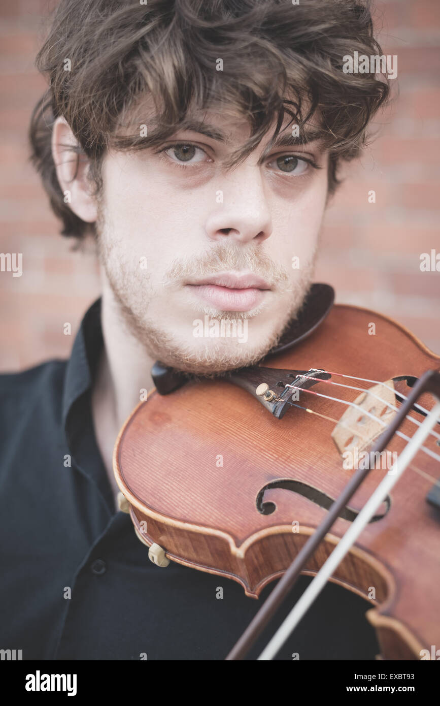 young handsome blonde italian violinist Stock Photo - Alamy