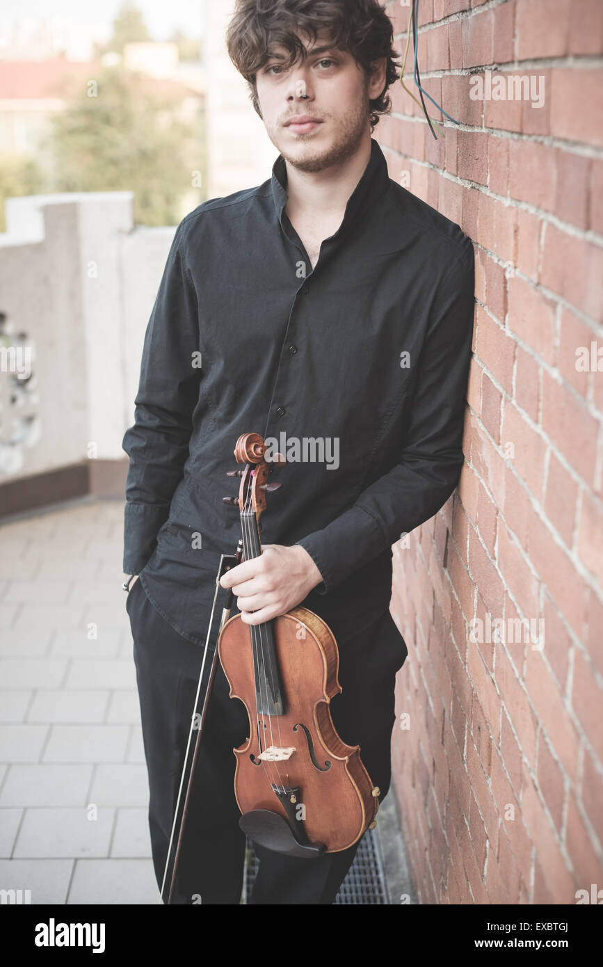 young handsome blonde italian violinist Stock Photo - Alamy