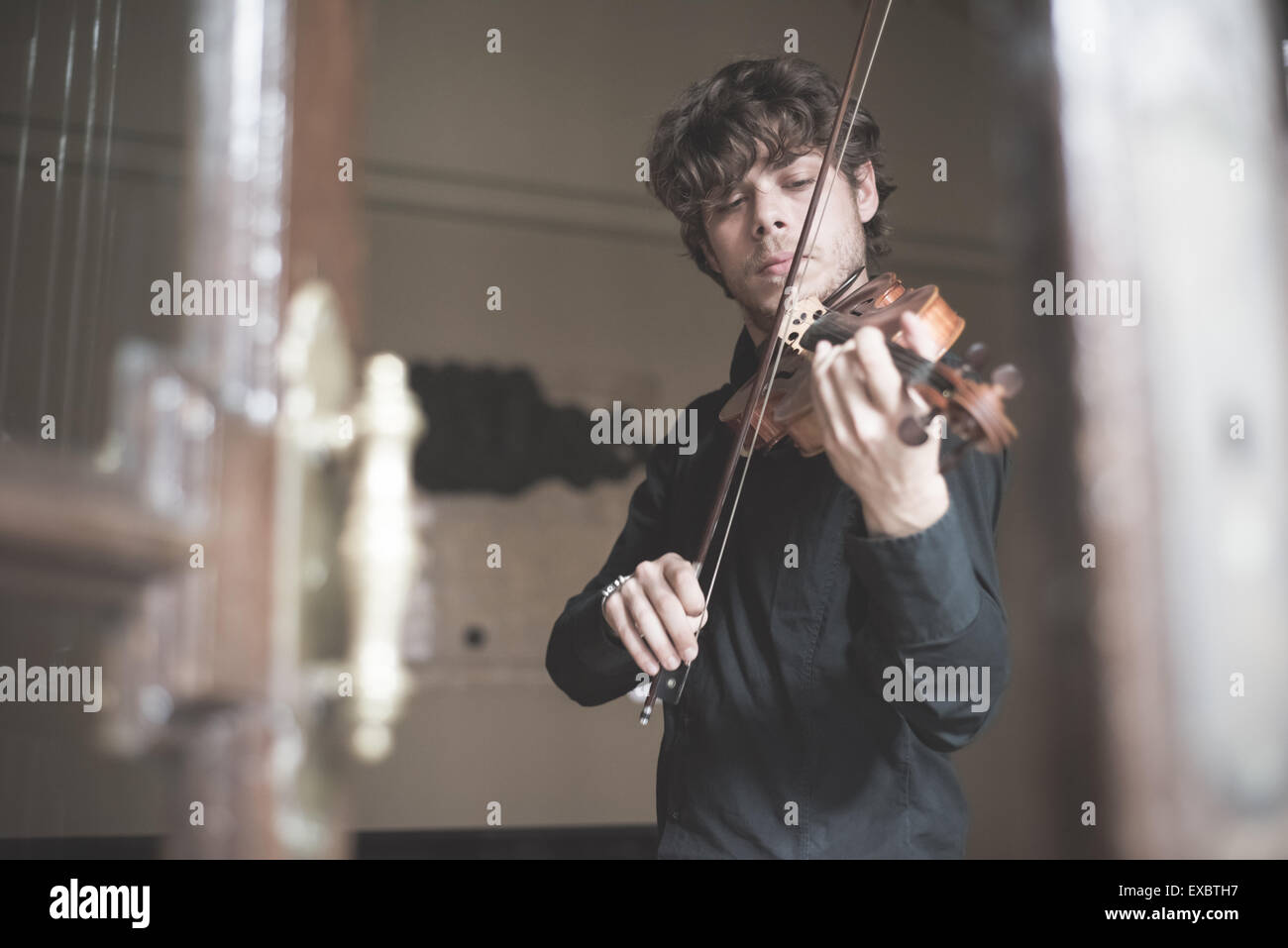 young handsome blonde italian violinist Stock Photo - Alamy