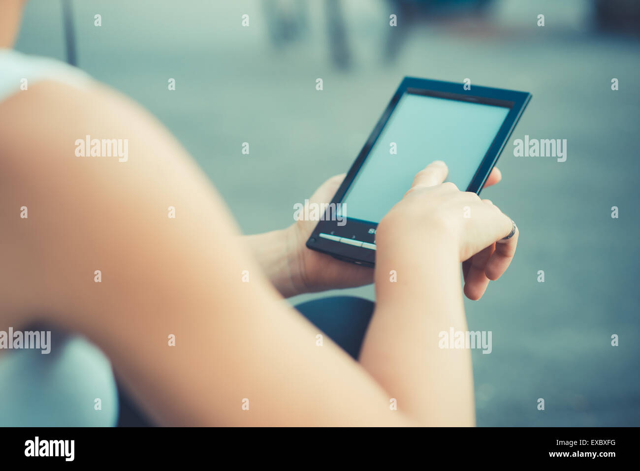 close up of woman hand using technological tablet device outdoor Stock ...
