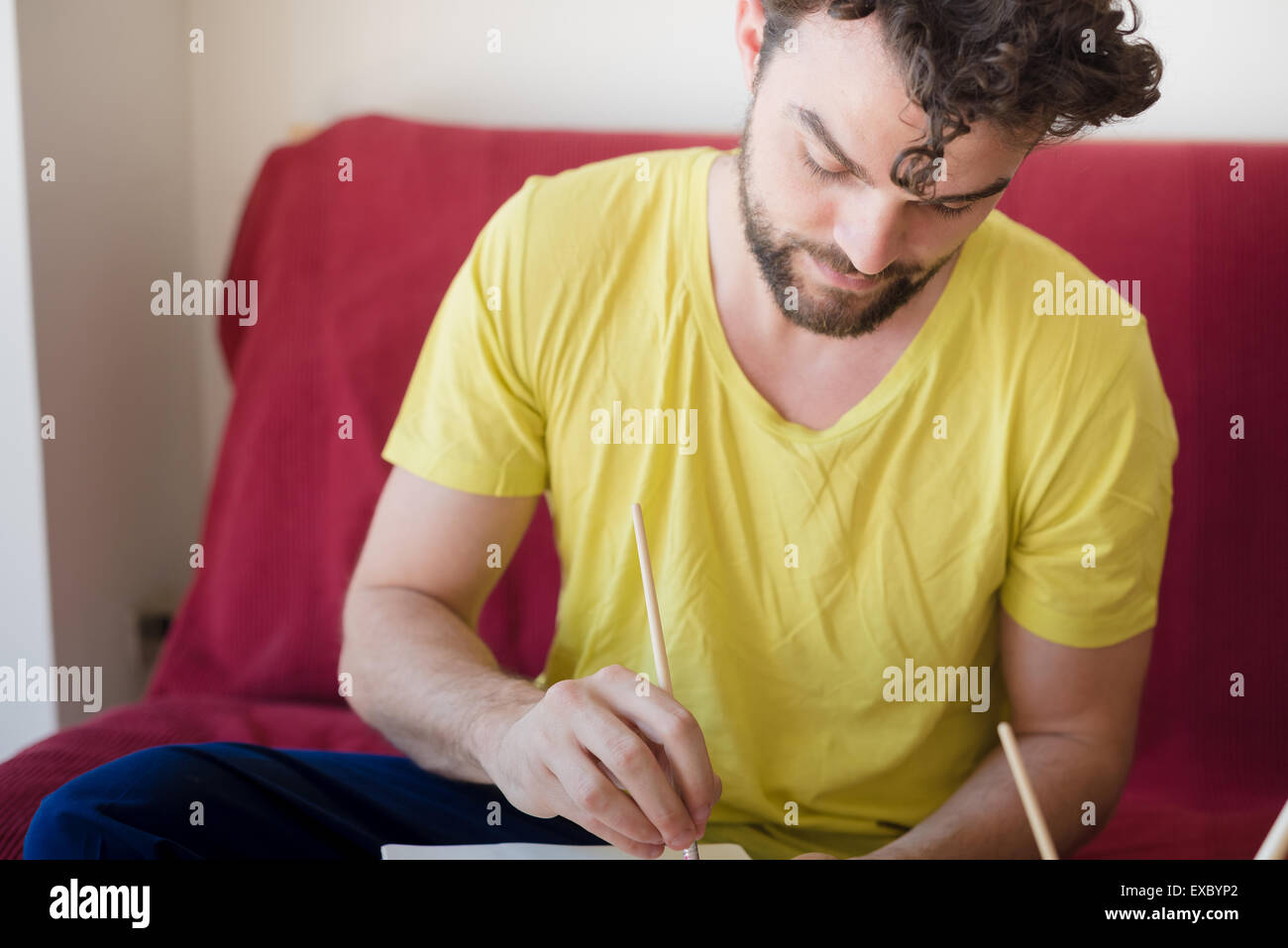 handsome hipster modern man painting at home Stock Photo - Alamy