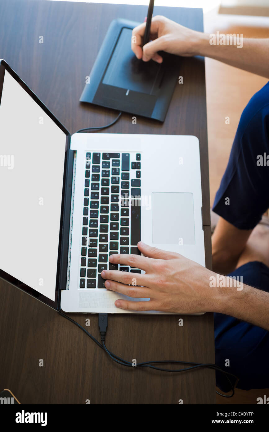 Using devices hi-res stock photography and images - Alamy