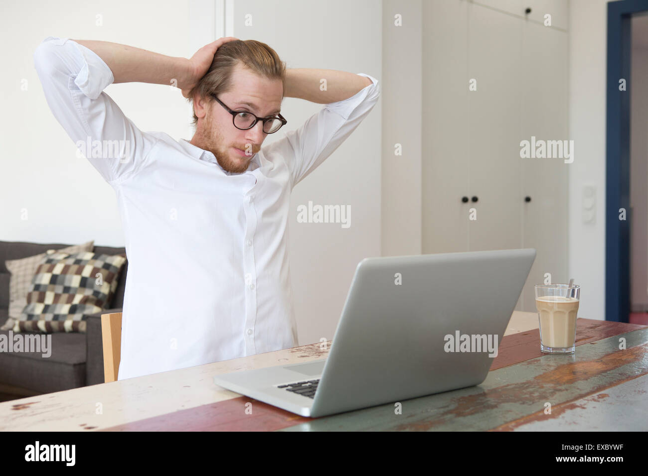 Work stressed man sitting desk hi-res stock photography and images - Alamy