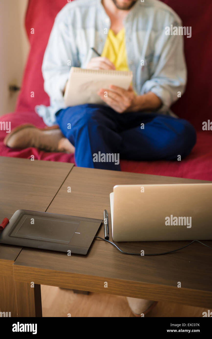 handsome hipster modern man painting at home Stock Photo - Alamy