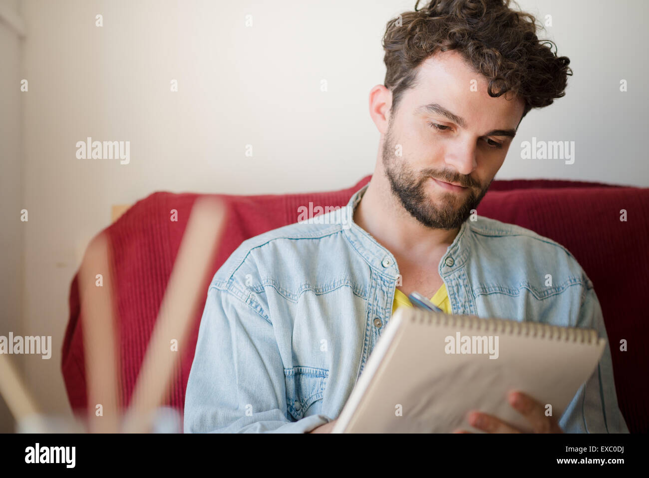 handsome hipster modern man painting at home Stock Photo - Alamy