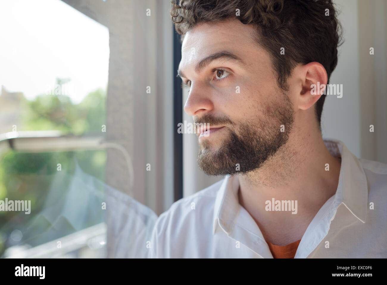 Modern man at home hi-res stock photography and images - Alamy