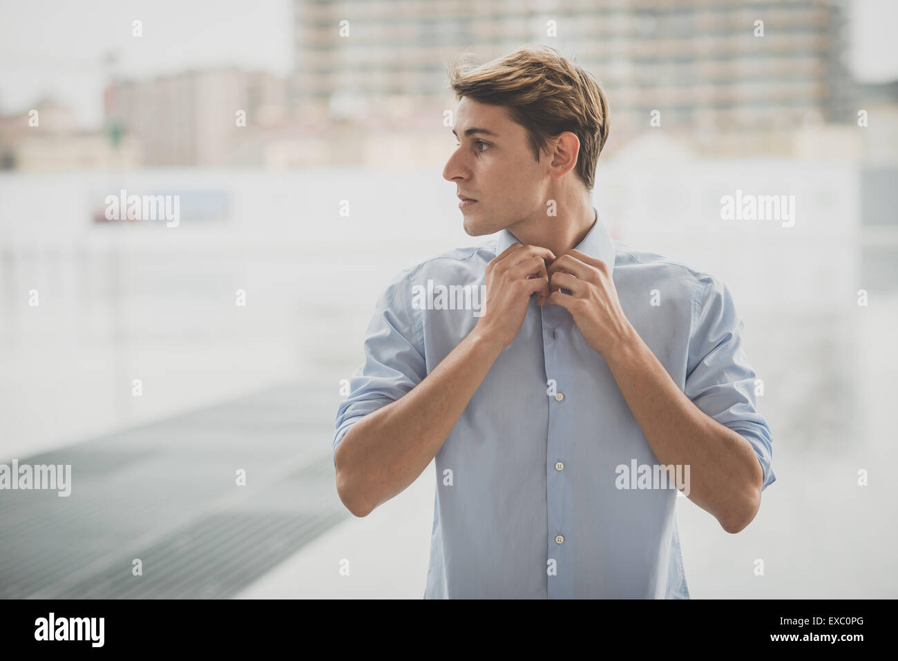 young model hansome blonde man in the city Stock Photo - Alamy