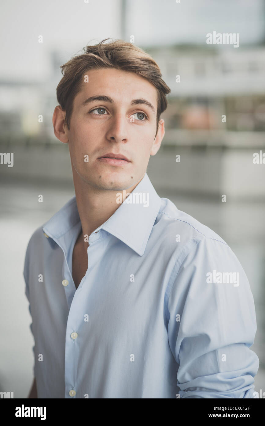 young model hansome blonde man in the city Stock Photo - Alamy