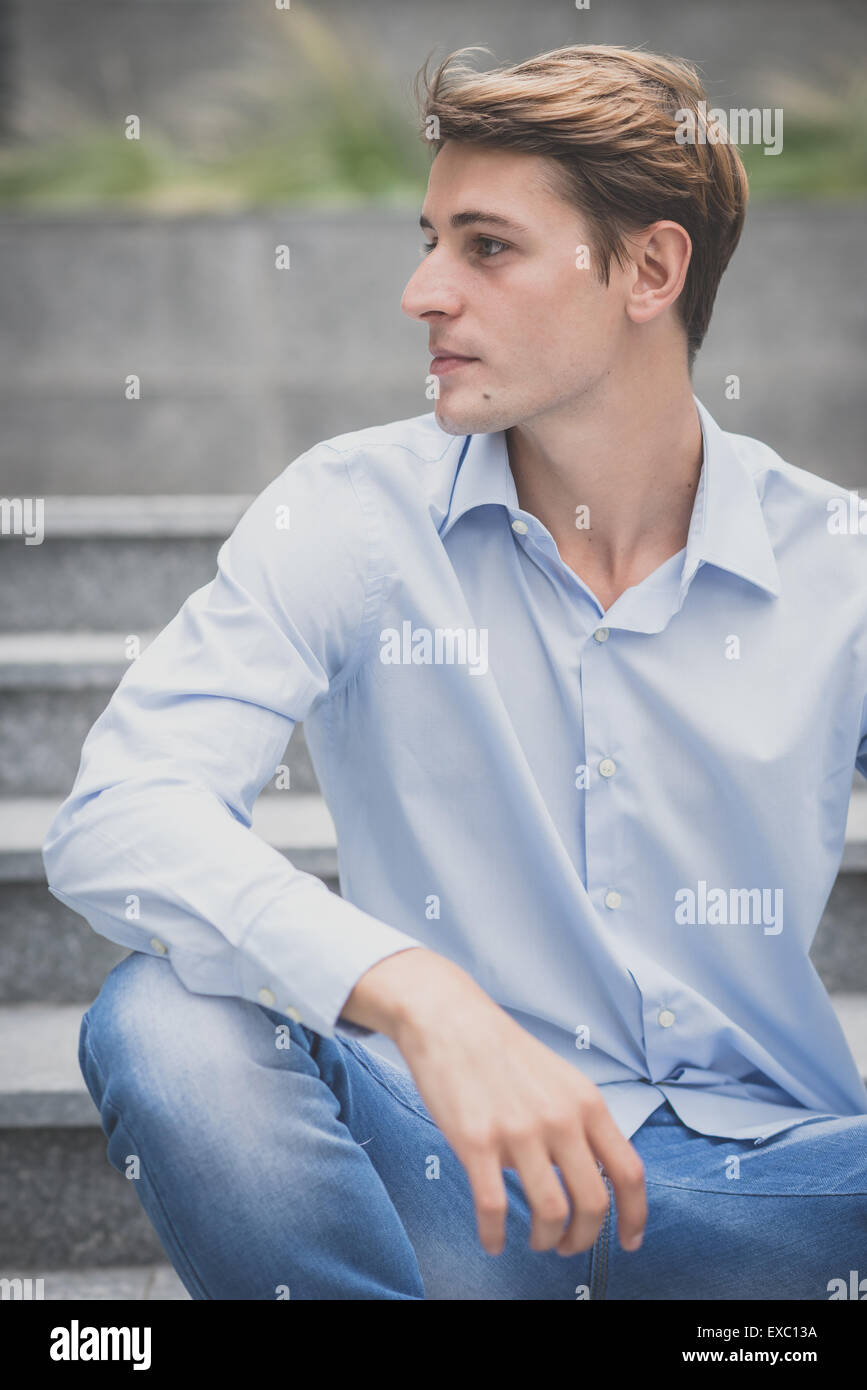 young model hansome blonde man in the city Stock Photo - Alamy
