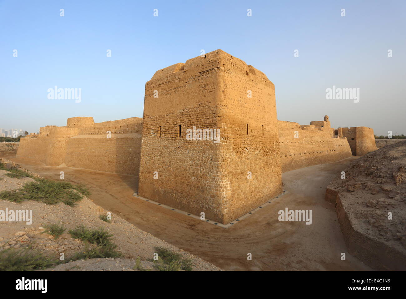 Fortified walls and moat of the Bahrain Fort, Kingdom of Bahrain Stock ...