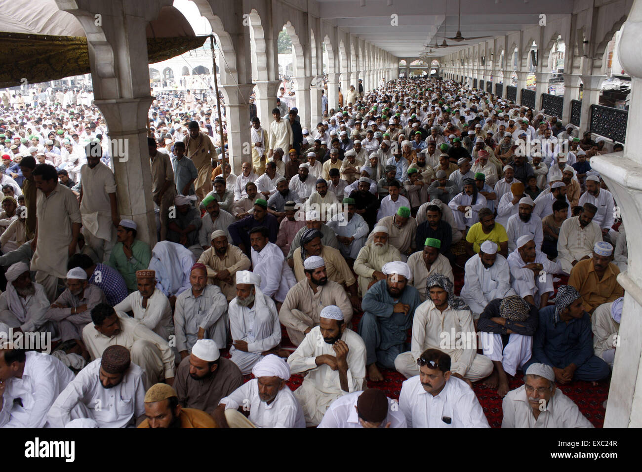 Lahore. 10th July, 2015. Pakistani Muslims offer Friday prayers at a ...
