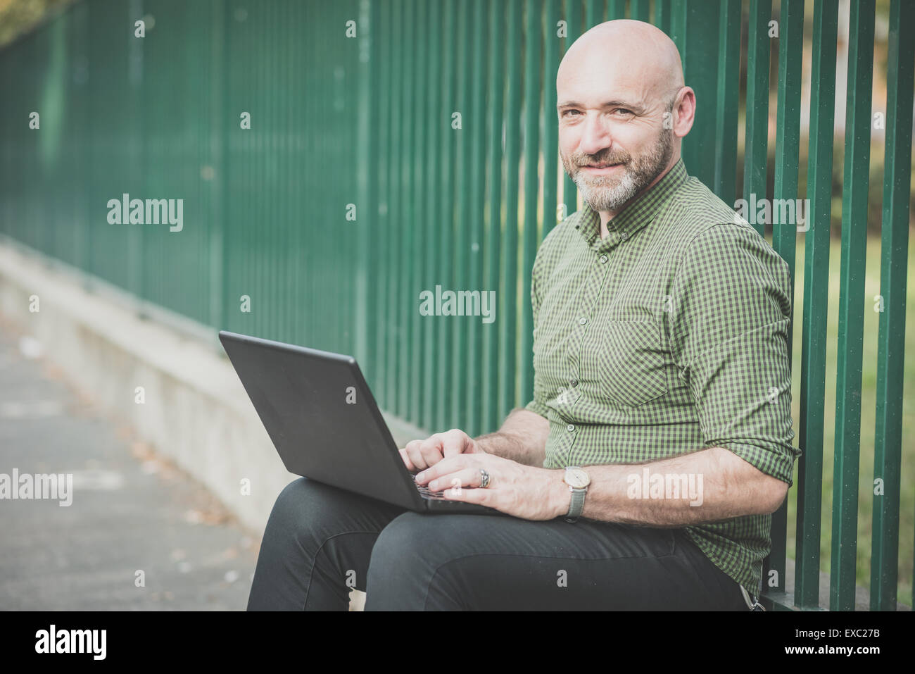 Mature bald bearded man using hi-res stock photography and images - Alamy