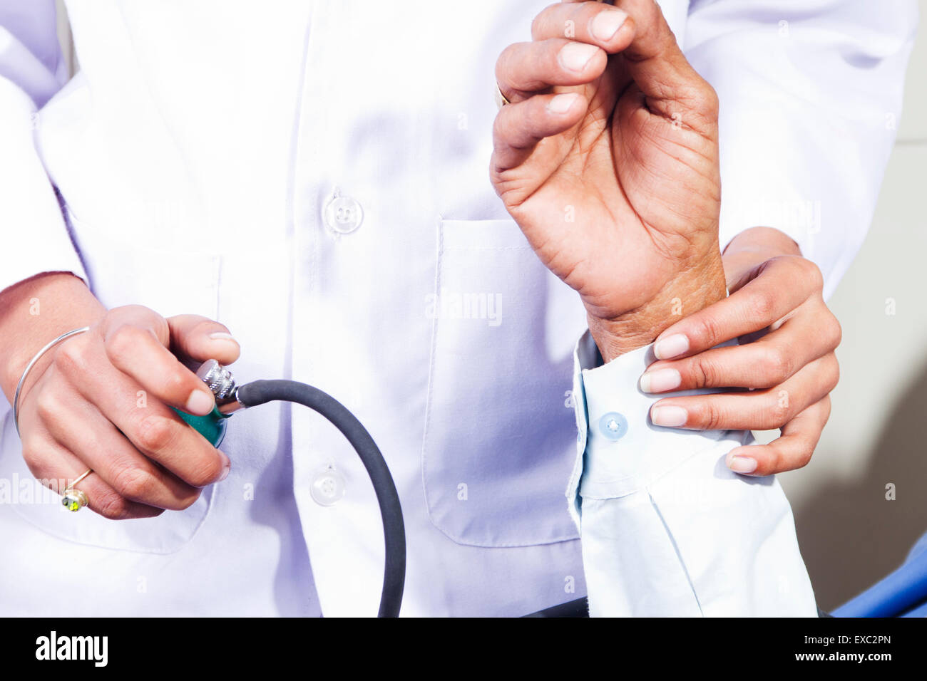 doctor hospital Patient Blood Pressure Checking Stock Photo - Alamy