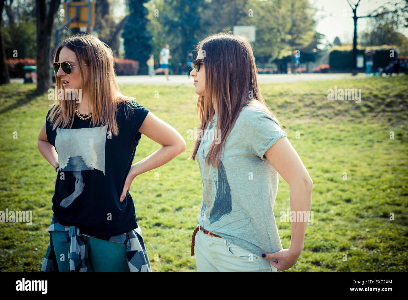 three beautiful friends authentic in urban contest Stock Photo - Alamy