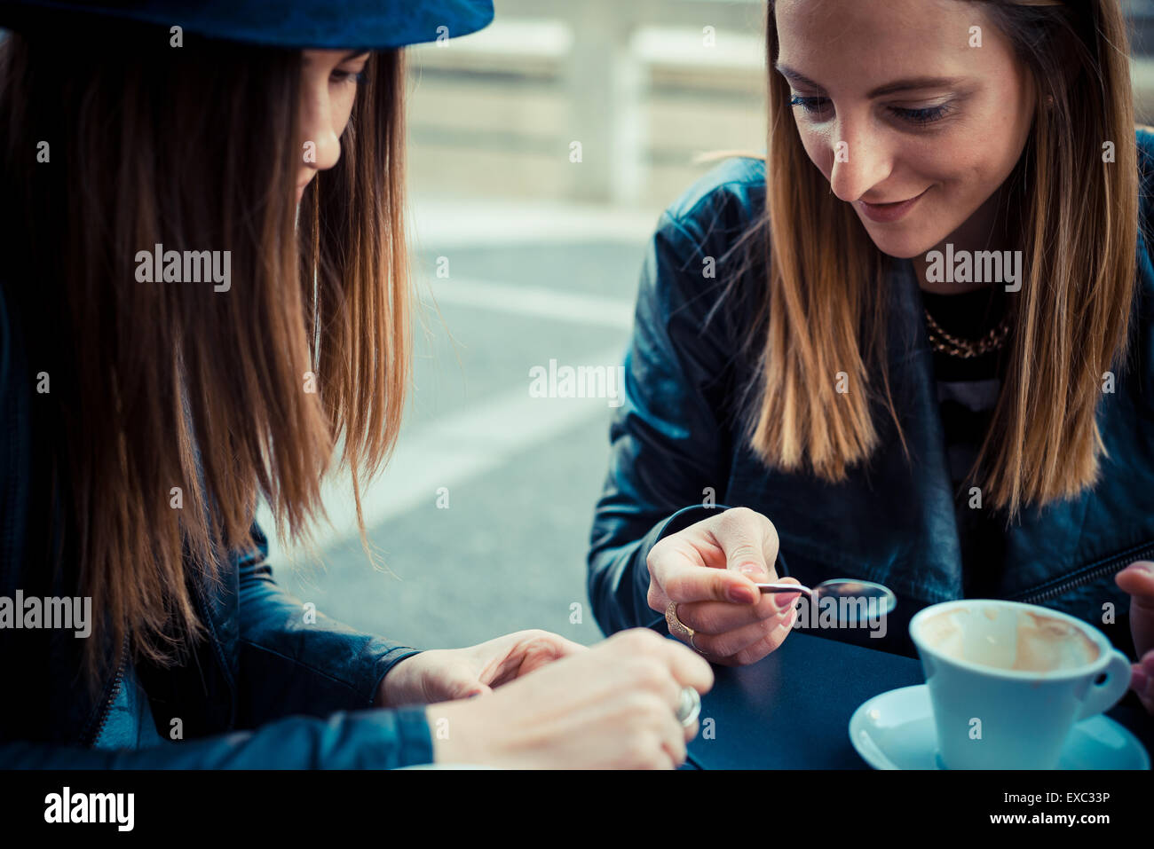 two beautiful friends authentic at the bar Stock Photo - Alamy