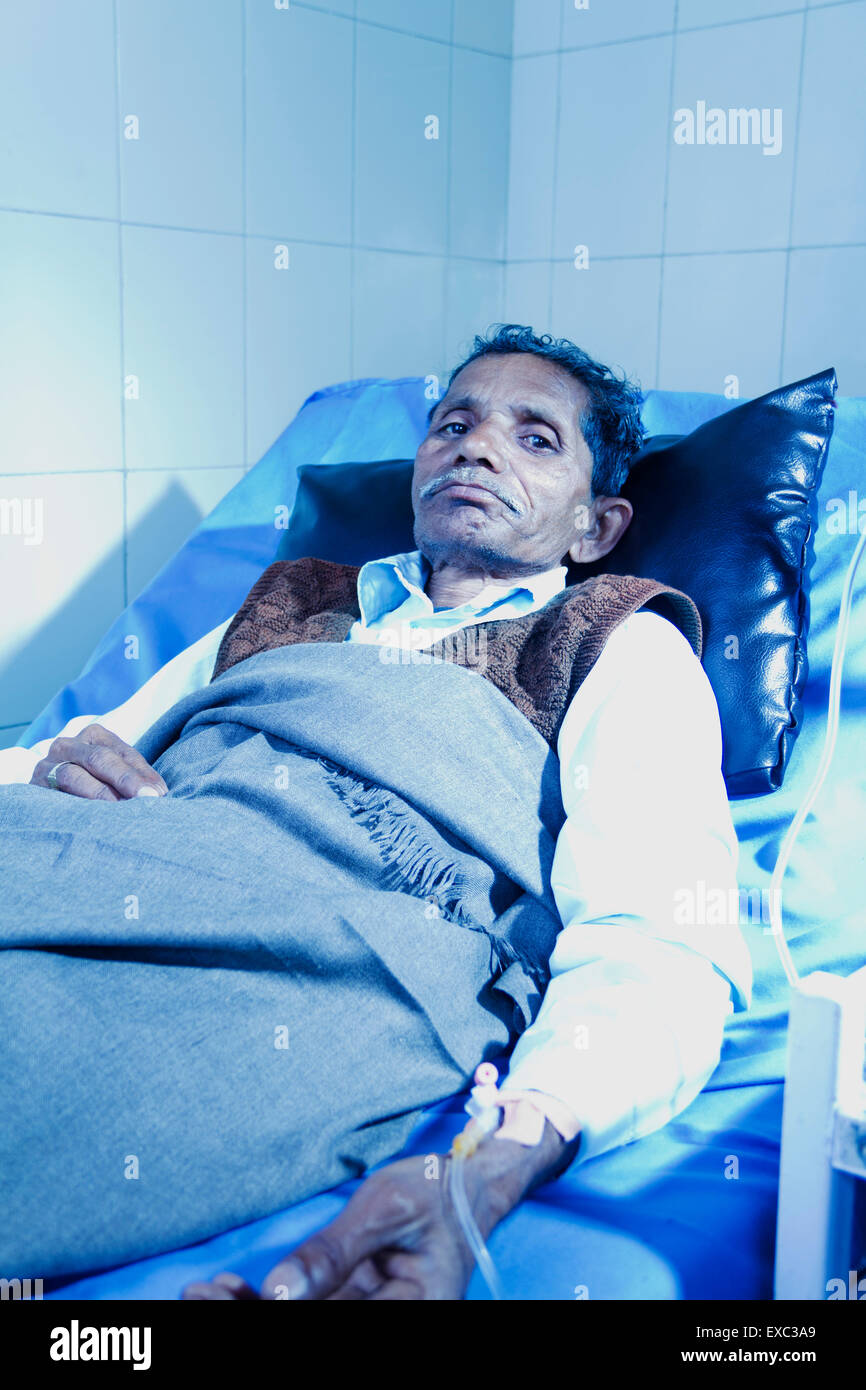 1 indian man Patient hospital Illness Stock Photo - Alamy