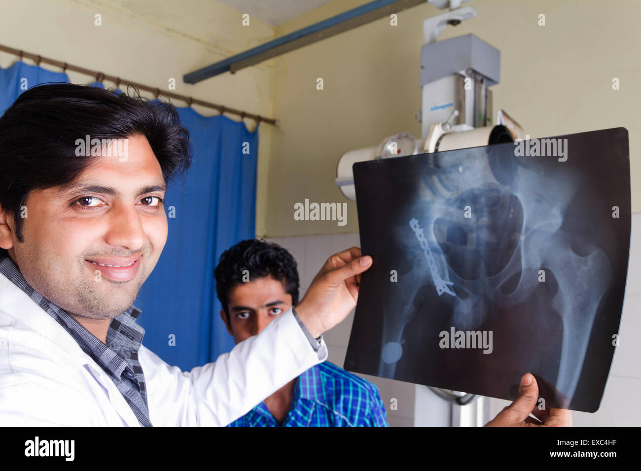 indian doctor hospital Patient X-Ray report Checking Stock Photo - Alamy