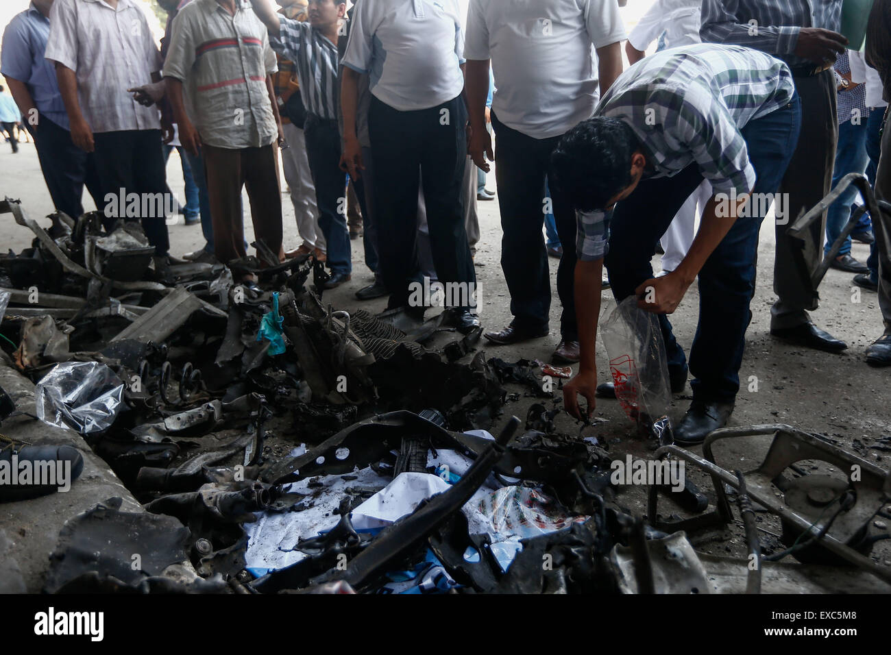 Cairo, Egypt. 11th July, 2015. Investigators work at the explosion site ...
