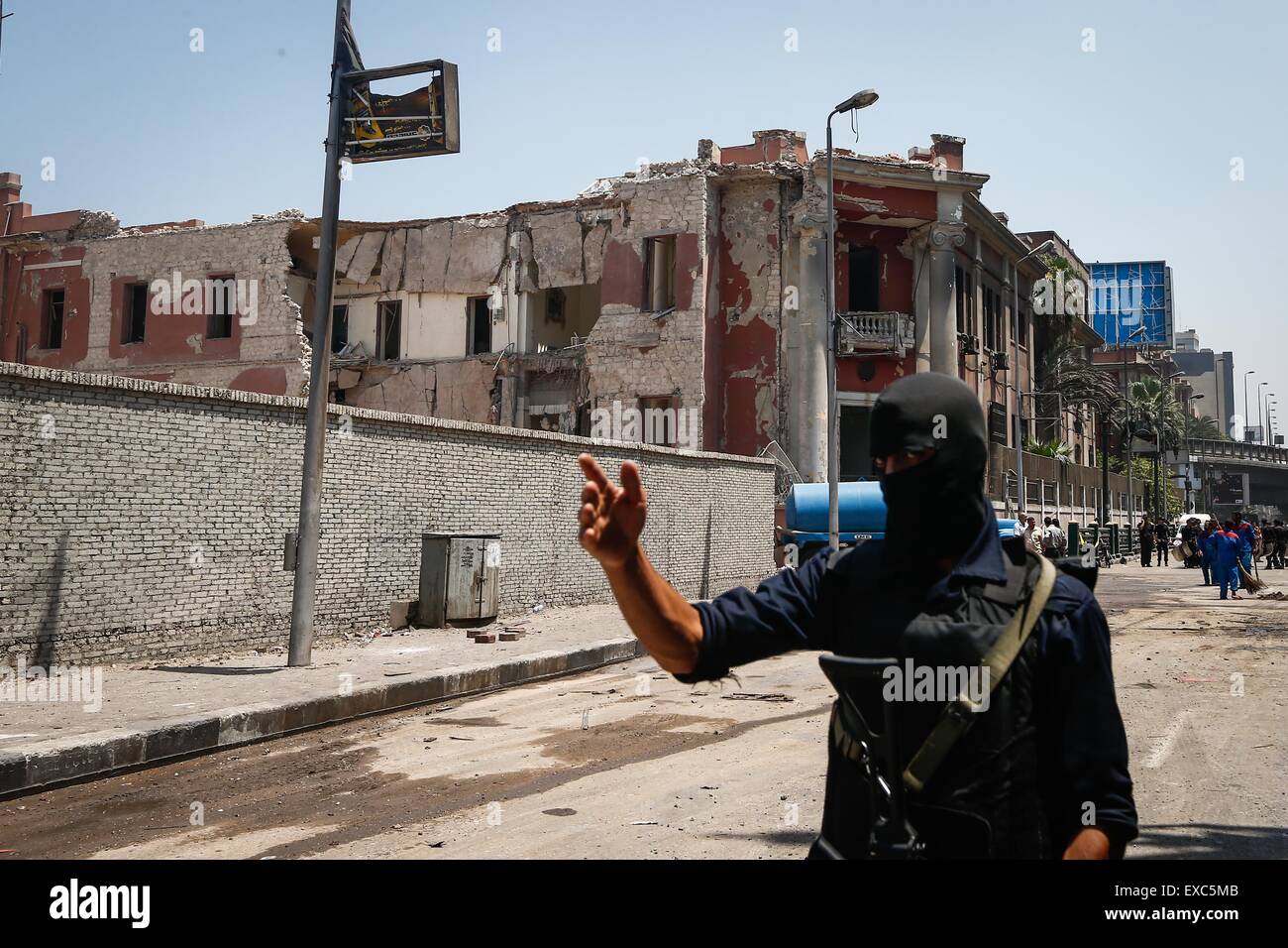 Cairo, Egypt. 11th July, 2015. An Egyptian security member stands guard ...