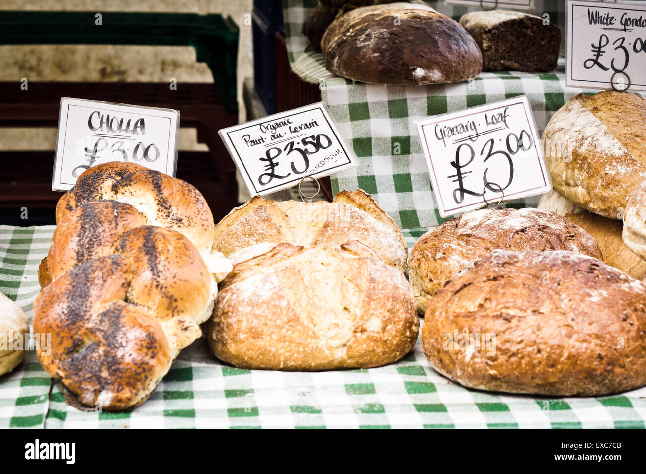 Loaves of fresh organic bread at a market in England Stock Photo - Alamy