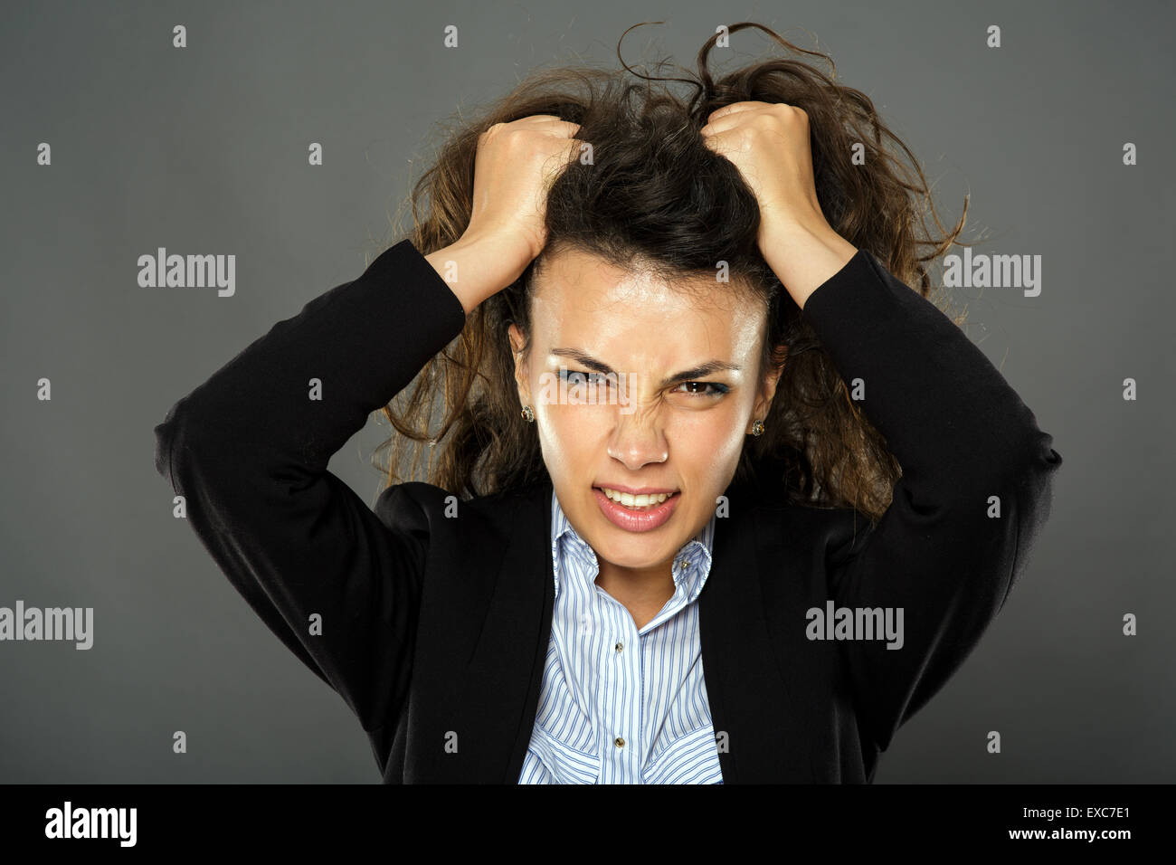 Angry upset girl pulling hair hi-res stock photography and images - Alamy