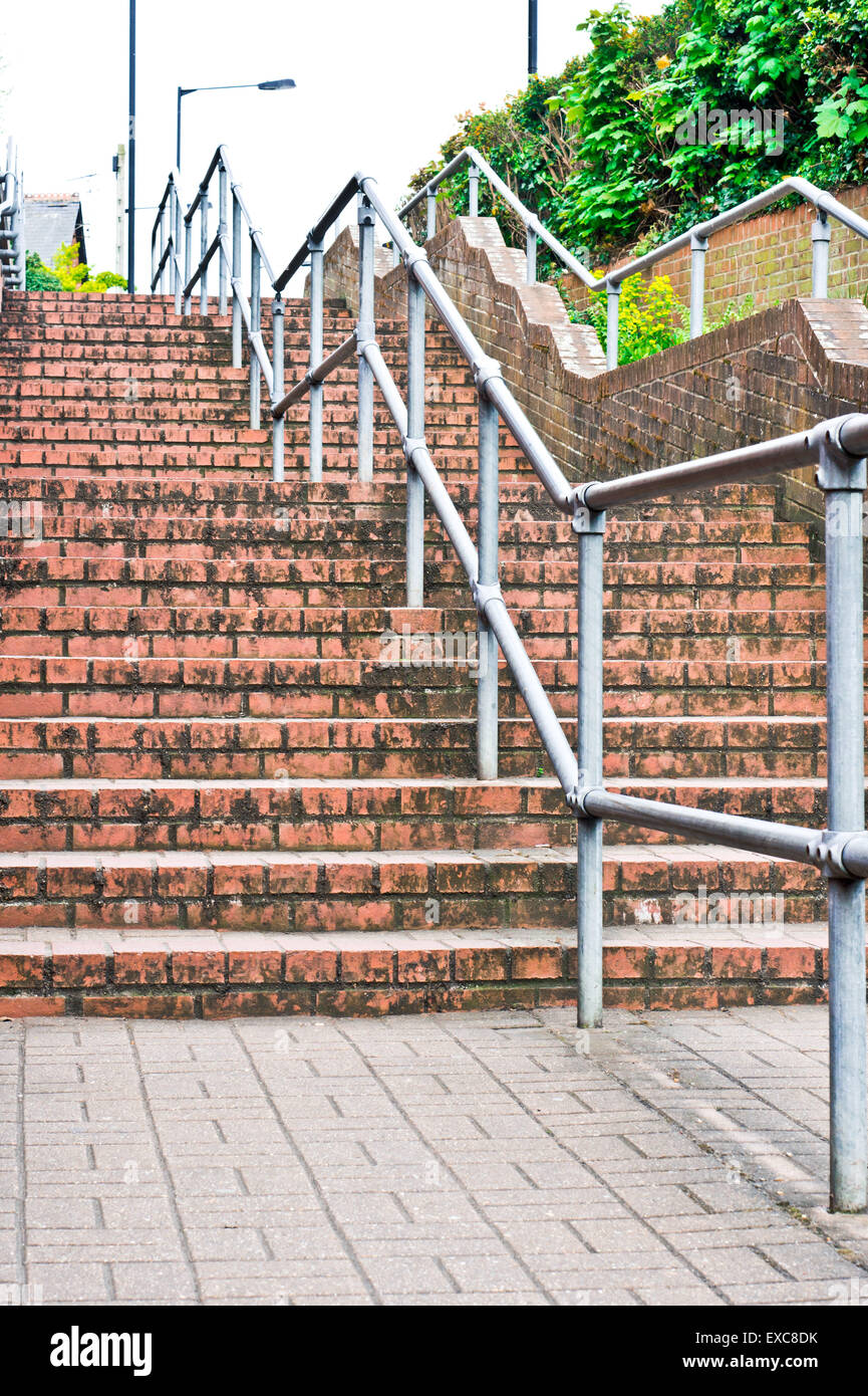 Concrete steps with metal railings from a low down perspective Stock ...