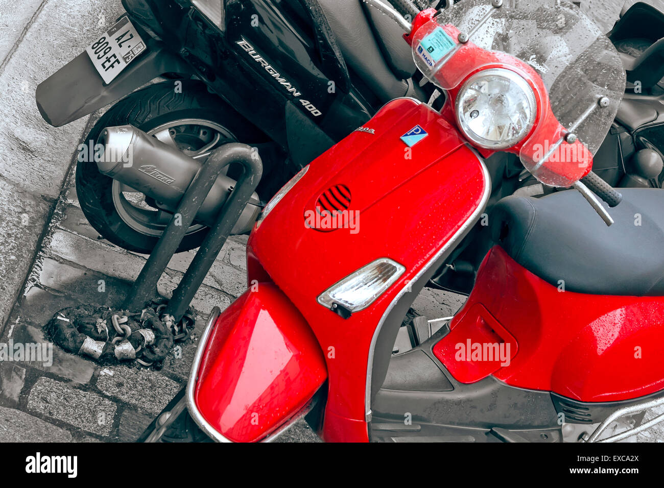 Red moped on a black & white background Stock Photo - Alamy