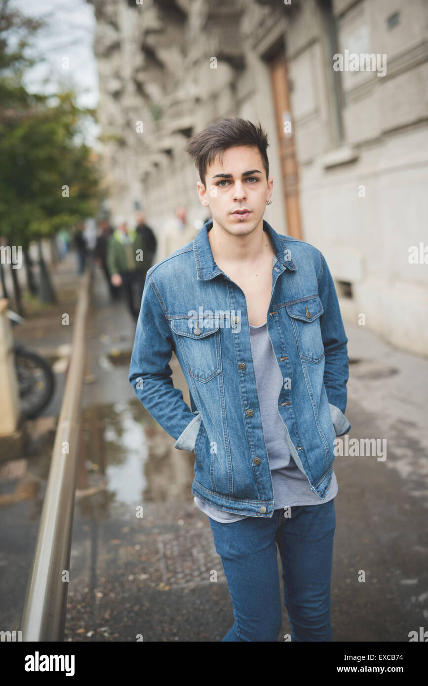 young handsome alternative dark model man in town Stock Photo - Alamy