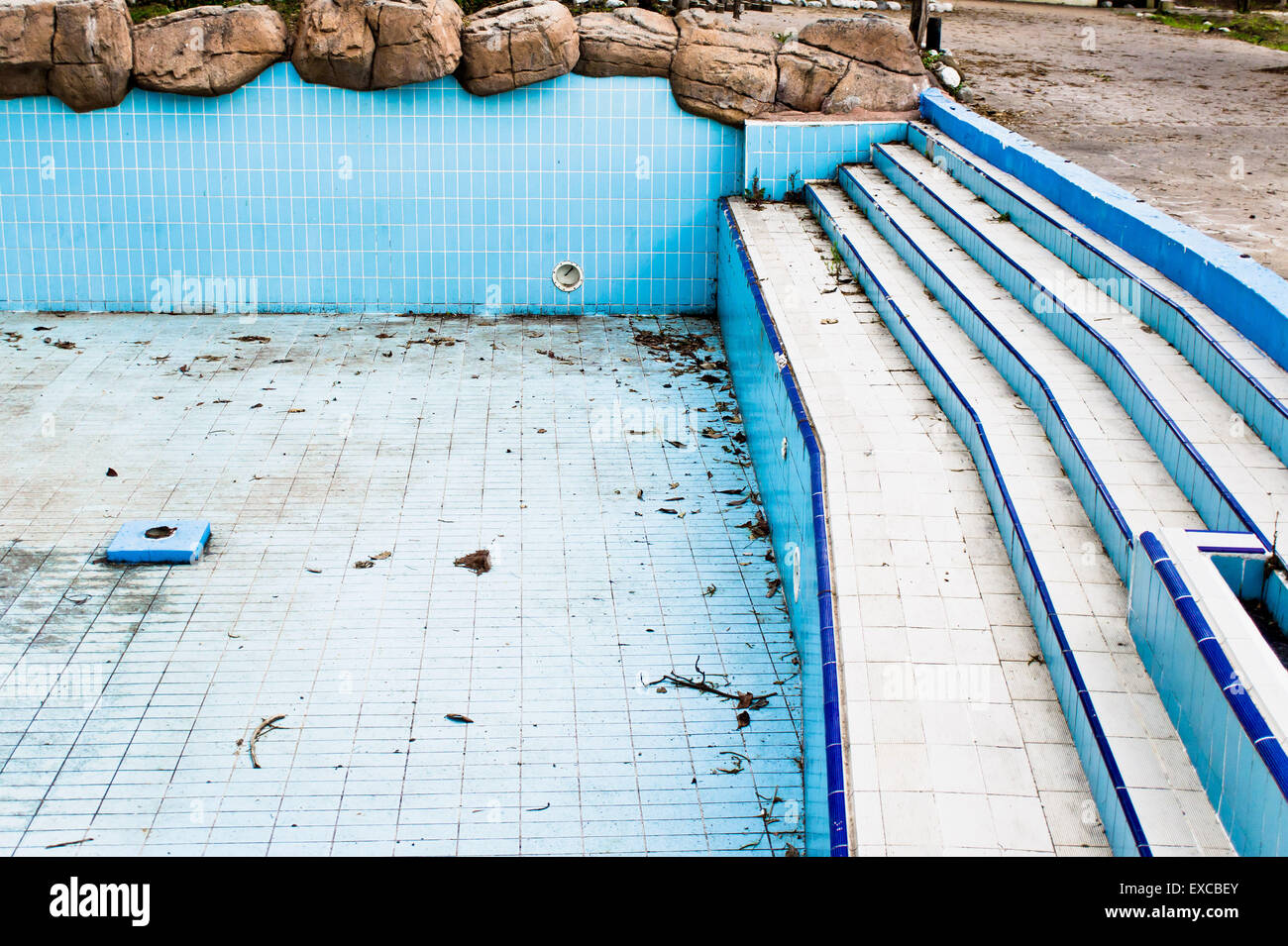 A derelict swimming pool in an abandoned amusement park Stock Photo - Alamy
