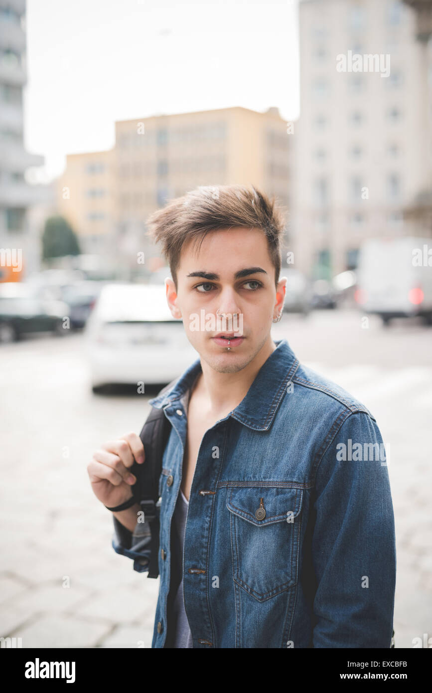 young handsome alternative dark model man in town Stock Photo - Alamy