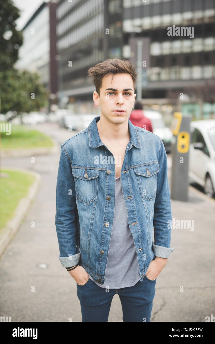 young handsome alternative dark model man in town Stock Photo - Alamy