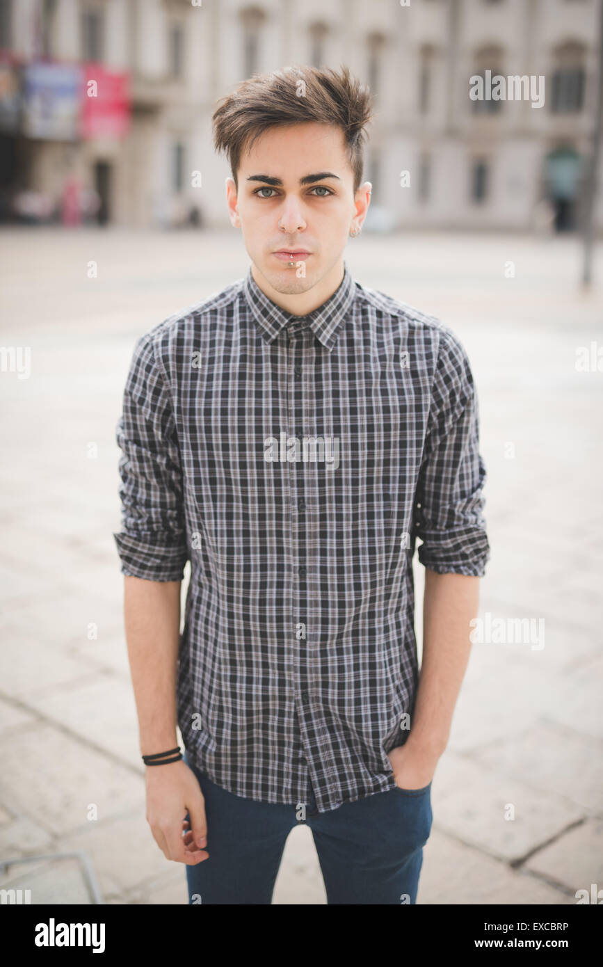 young handsome alternative dark model man in town Stock Photo - Alamy