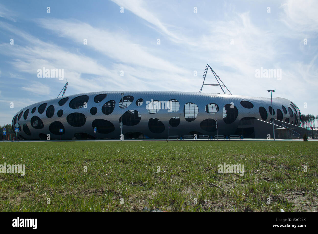 view of big oval stadium with the blue sky and clouds Stock Photo - Alamy