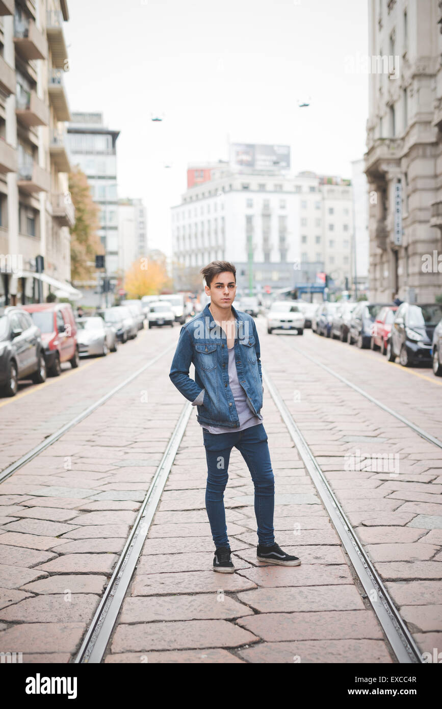 young handsome alternative dark model man in town Stock Photo - Alamy