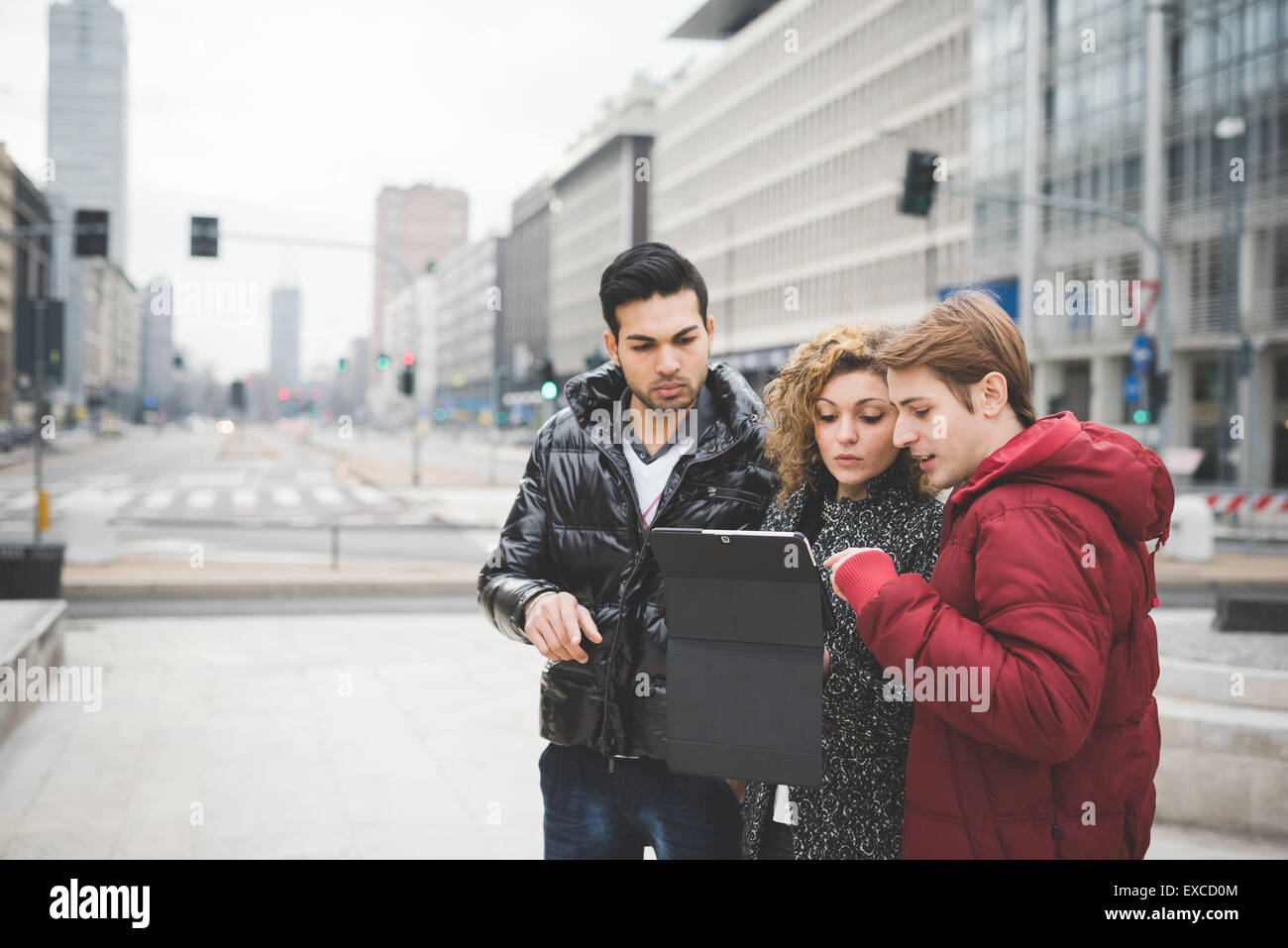 Multiracial business people working outdoor in town connected with ...