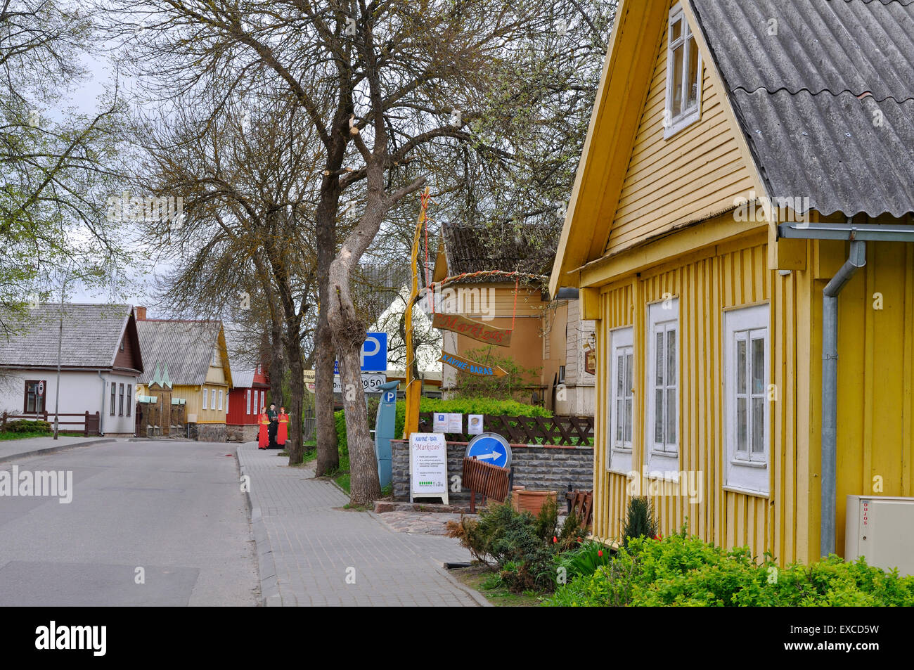 Street with typical triple-windowed wooden Karaim houses in Trakai ...