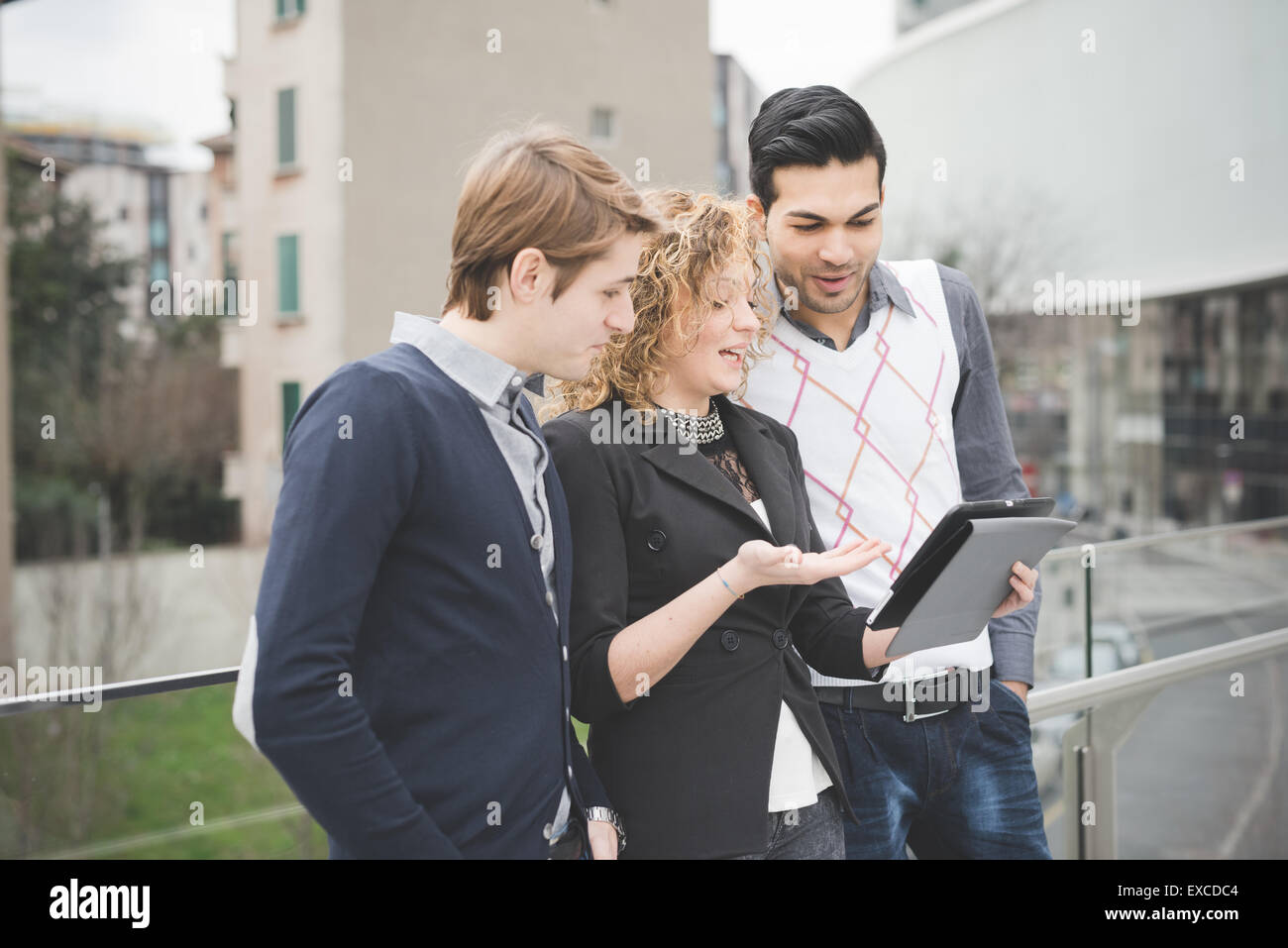 Multiracial business people working outdoor in town connected with ...